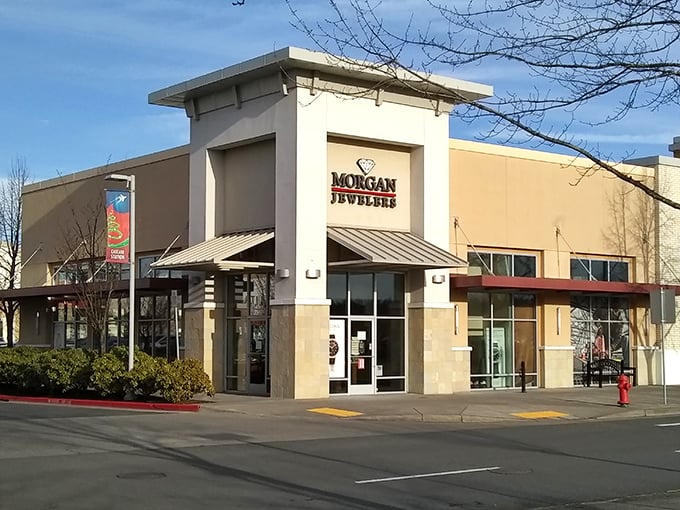 Morgan Jewelers stands sentinel at the corner, its modern architecture a stark contrast to the typical mall jewelry kiosk experience.