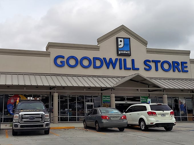 That iconic blue sign beckons treasure hunters like a lighthouse guiding ships to shore. Adventure awaits behind those glass doors. 