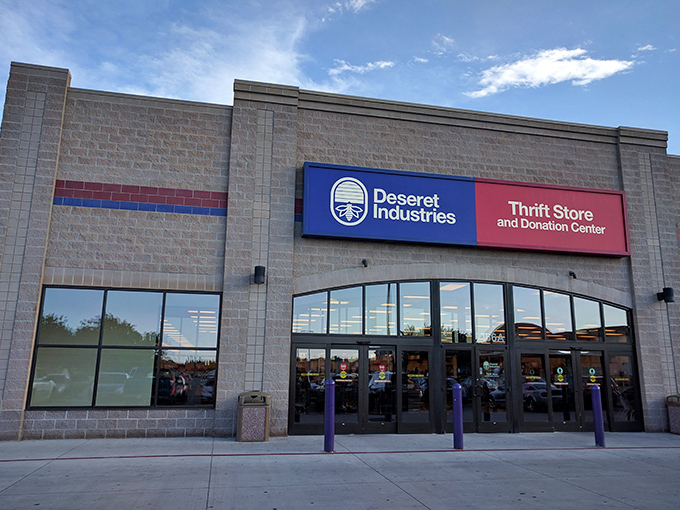 Blue skies and budget finds! The welcoming facade of D.I. promises adventure for thrift hunters with its distinctive blue and red signage.