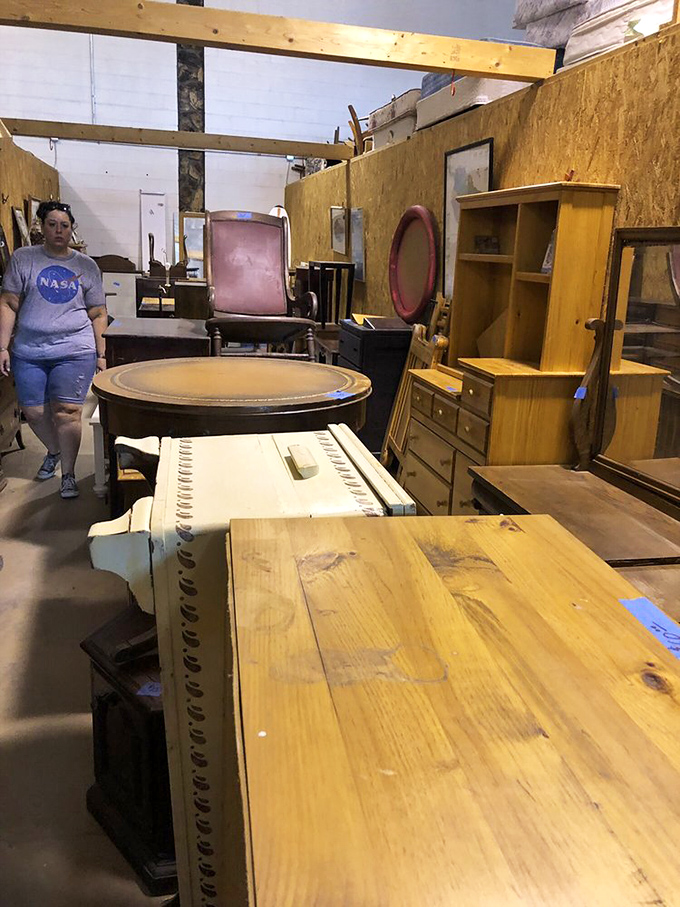 Vintage furniture heaven! Solid wood pieces with stories to tell sit patiently waiting for their second chapter in someone's home.