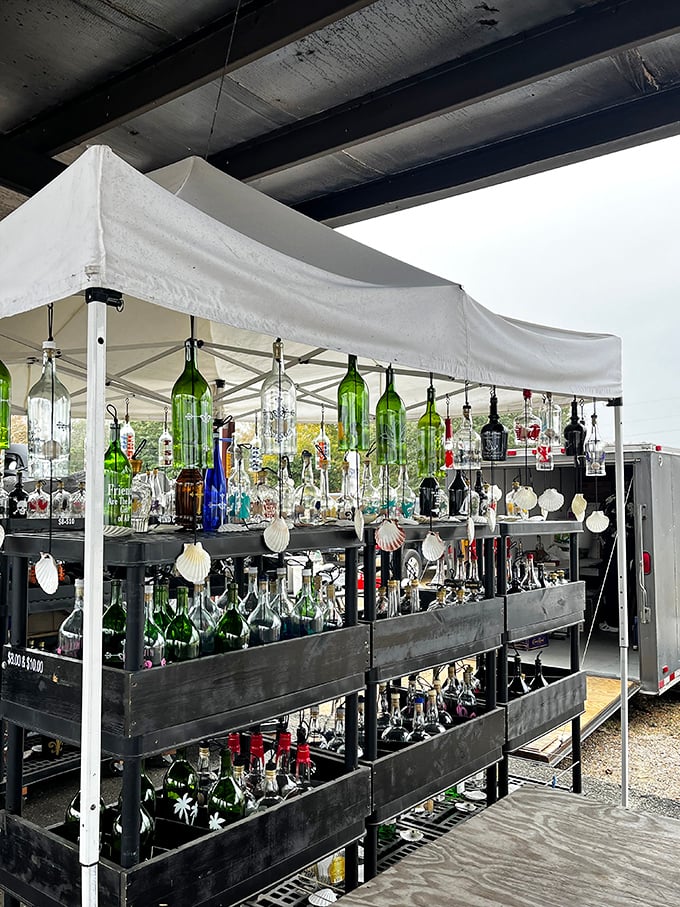 Nature meets artistry in these shimmering bottle creations. Sunlight transforms these everyday vessels into magical wind-catching symphonies.