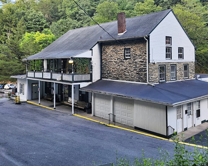 The historic visitor center blends rustic charm with Pennsylvania practicality, standing sentinel at the gateway to underground adventures since the Victorian era.