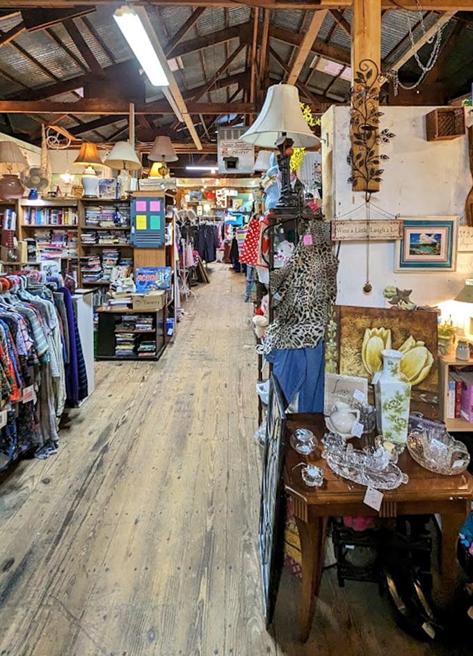 Wooden floors that have witnessed thousands of treasure hunts creak beneath racks of possibility in this thrifter's paradise.