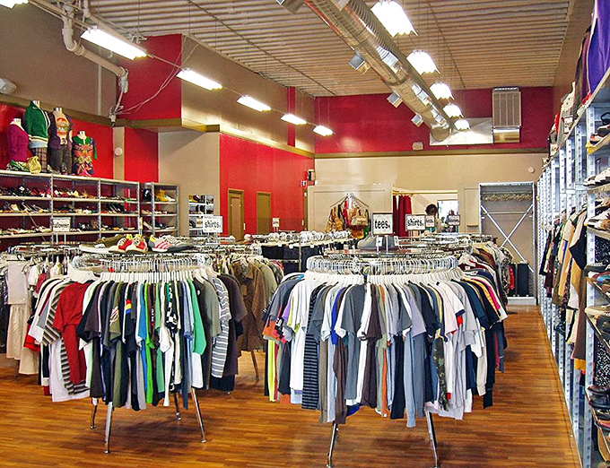 Circular racks organized by size and style transform the thrifting experience from chaotic dig to curated discovery. Marie Kondo would approve.