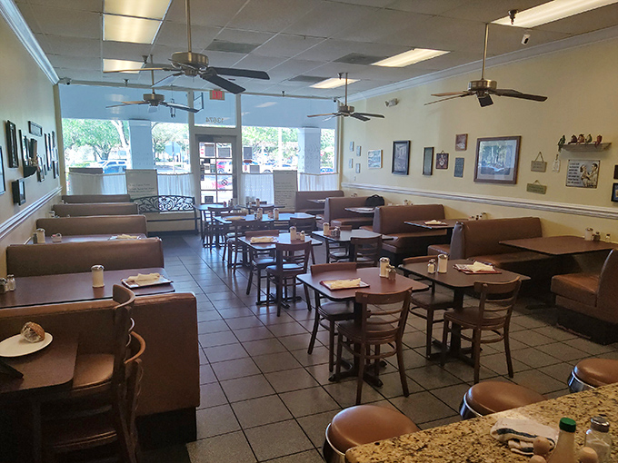 Simple brown booths and ceiling fans create the perfect no-frills atmosphere where the food, not the decor, takes center stage.