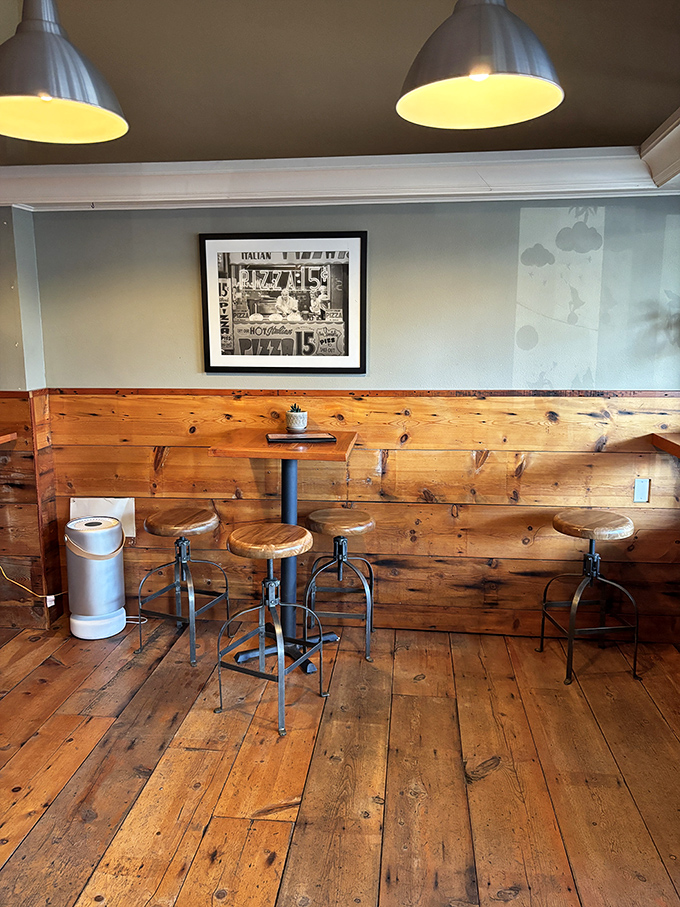 Rustic wooden interiors and industrial-style seating create the perfect backdrop for serious pizza consumption&mdash;no distractions, just focus on the food.