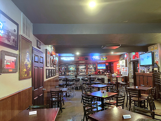 Inside Lucky 13, neon signs cast a warm glow over wooden tables where burger dreams come true. It's like your coolest friend's basement, but with better food.