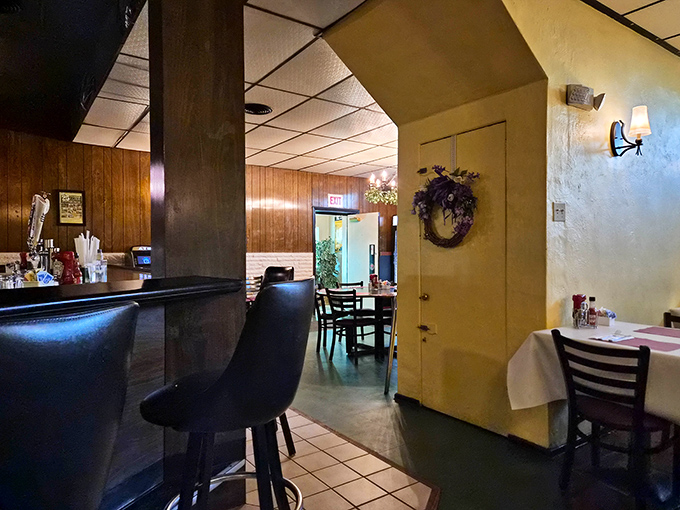 Classic wood paneling and comfortable seating create that "time stood still" atmosphere where conversations flow as easily as the drinks.