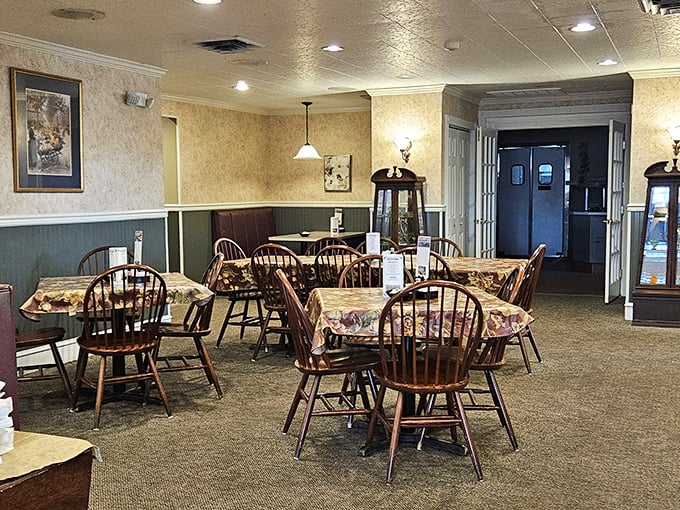 Windsor chairs and floral tablecloths create that "grandma's dining room" vibe where calories don't count and conversations flow freely.
