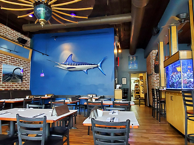 Blue walls, exposed brick, and that magnificent marlin artwork create the perfect maritime mirage in a state better known for its peaks than its beaches.