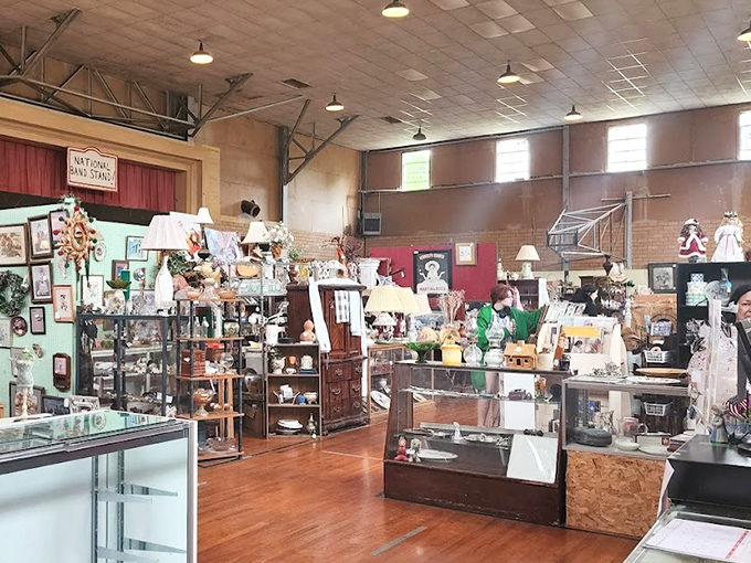 The former gymnasium now serves as an antique wonderland, with high ceilings and original features framing countless collectibles.