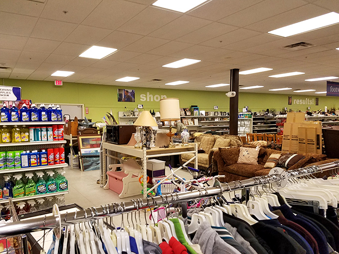 Step inside to organized chaos—where furniture, clothing racks, and household goods create a bargain hunter's playground.