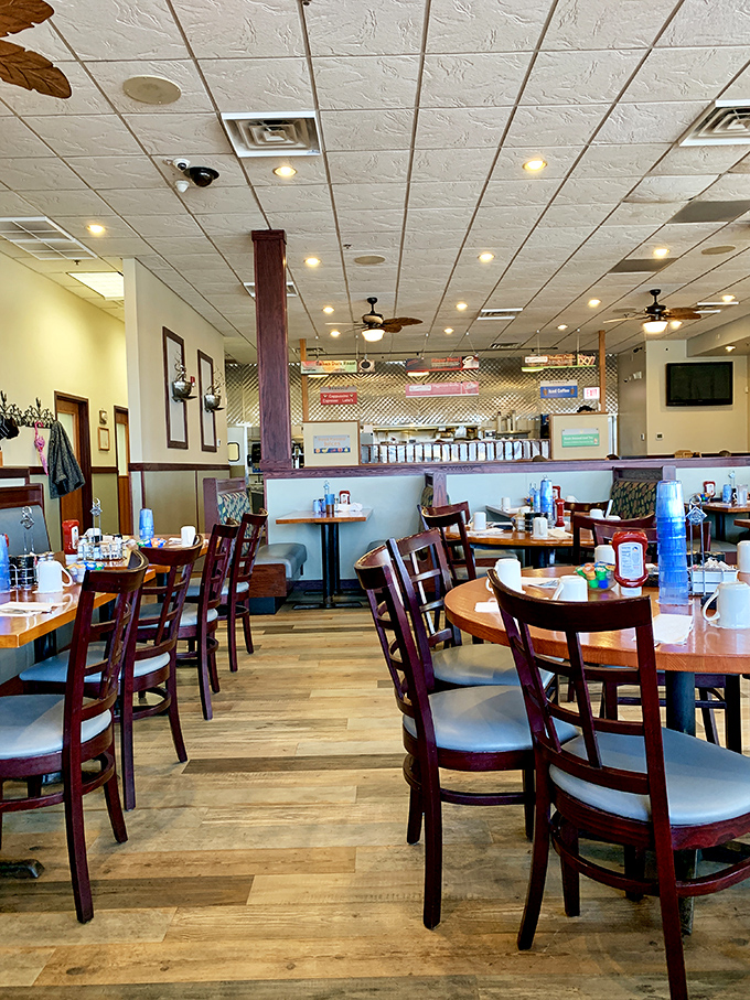 Classic diner charm meets breakfast comfort in this warm interior where wooden chairs have supported generations of happy, syrup-satisfied customers.