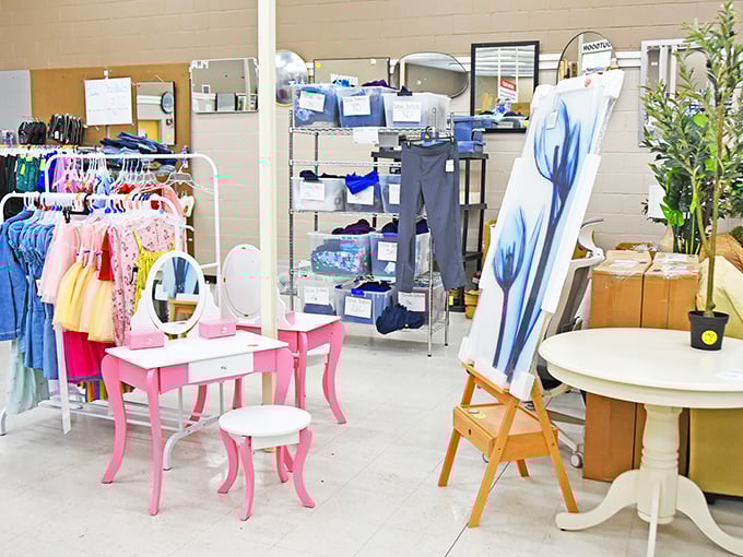 Pink vanities and children's clothes neighbor practical storage solutions in this retail wilderness where organization takes a creative approach to categorization.
