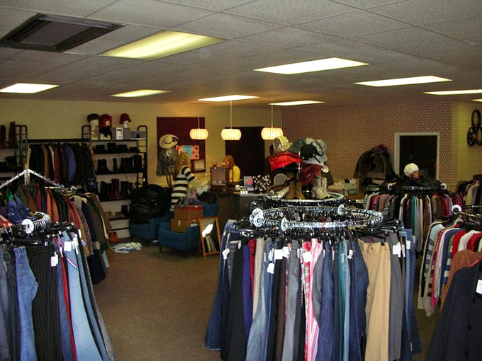 Racks upon racks create a textile labyrinth where vintage denim and contemporary finds coexist in perfect harmony.