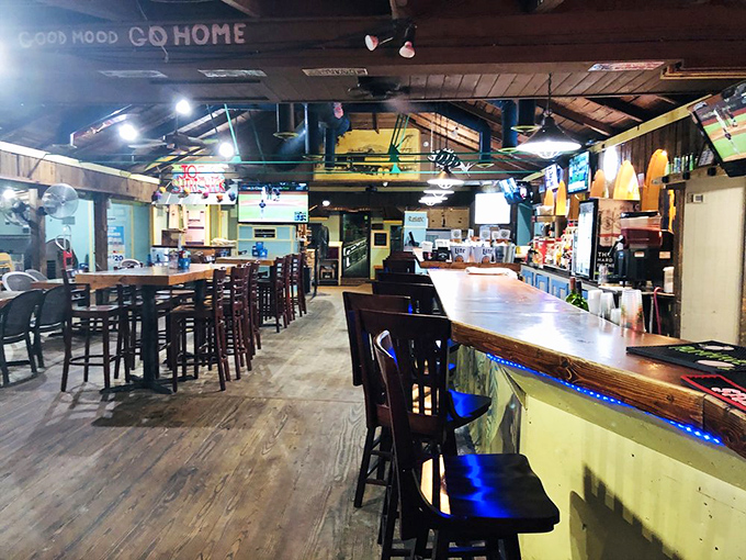 Inside Gator Joe's, rustic wooden beams and casual vibes create the perfect backdrop for that "I'm definitely ordering dessert" kind of meal.