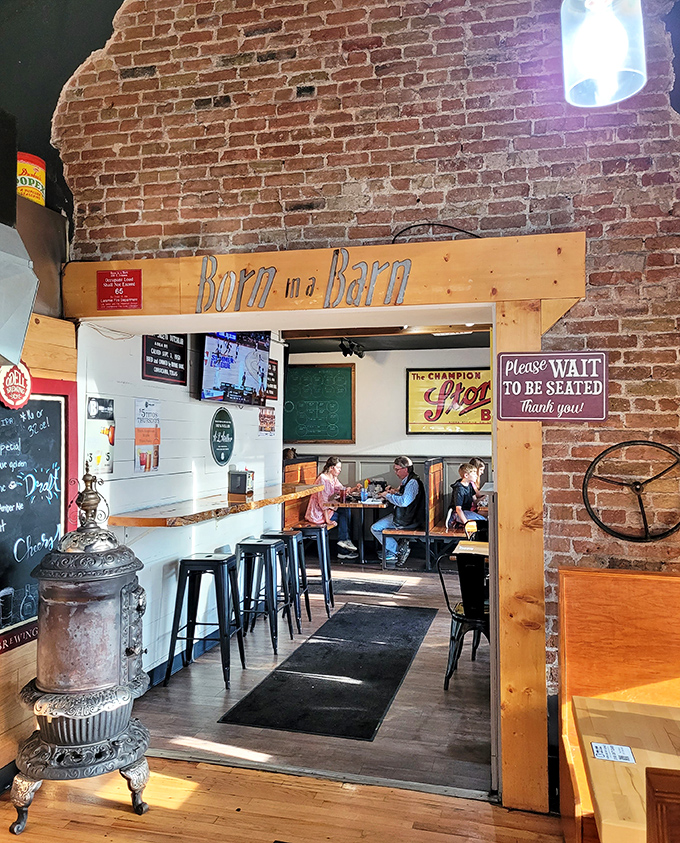 Step through this wooden doorway and prepare for flavor transformation. The rustic entrance frames what locals know is Wyoming's wing wonderland.
