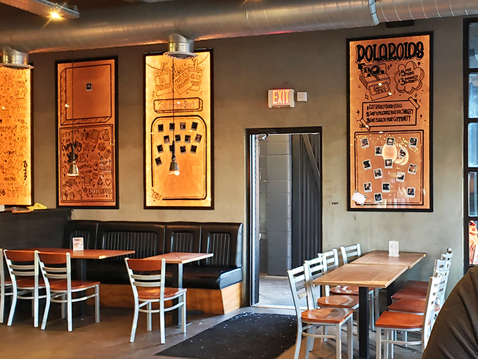 Industrial chic meets barbecue comfort &ndash; the Polaroid wall tells stories of satisfied customers who couldn't resist documenting their meat-induced happiness.