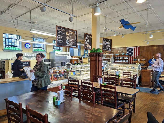 Wooden tables, ladder-back chairs, and chalkboard menus create that "I've discovered something special" feeling that makes neighborhood bakeries worth the trip.
