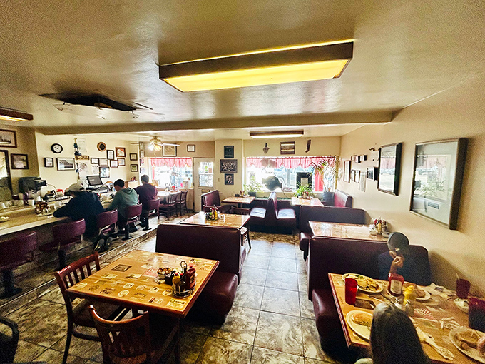 Classic diner ambiance with burgundy booths where strangers become friends and regulars are treated like royalty&mdash;the breakfast club everyone wants to join.