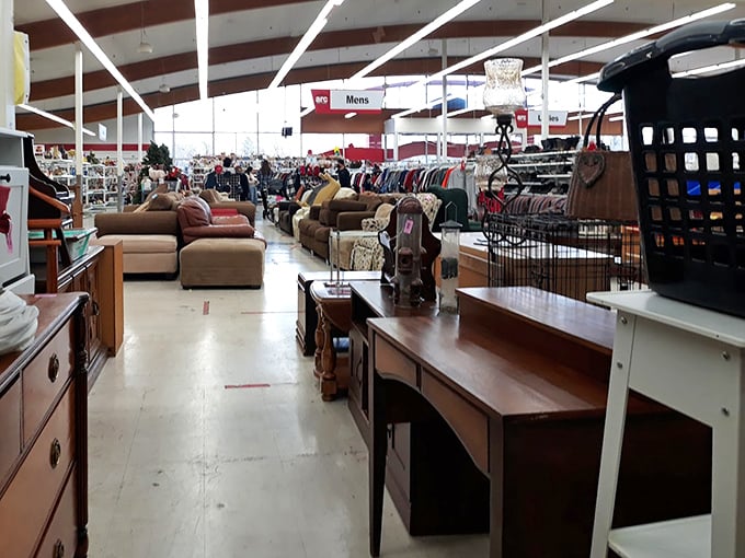 Aisles stretch toward the horizon like a thrifter's yellow brick road, where furniture and clothing coexist in organized harmony.