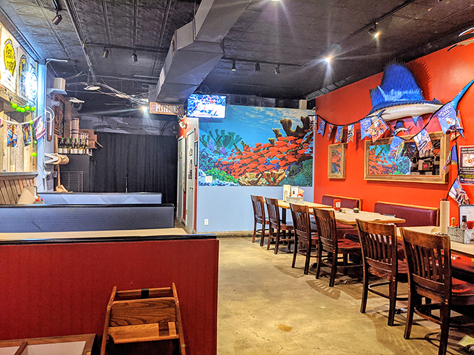 Vibrant orange walls and nautical touches create the perfect backdrop for seafood adventures. Like stepping into a coastal joint that took a wrong turn at Albuquerque.