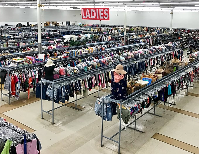Endless racks stretch toward retail infinity. The ladies' section alone could outfit every book club in Fort Worth for decades.