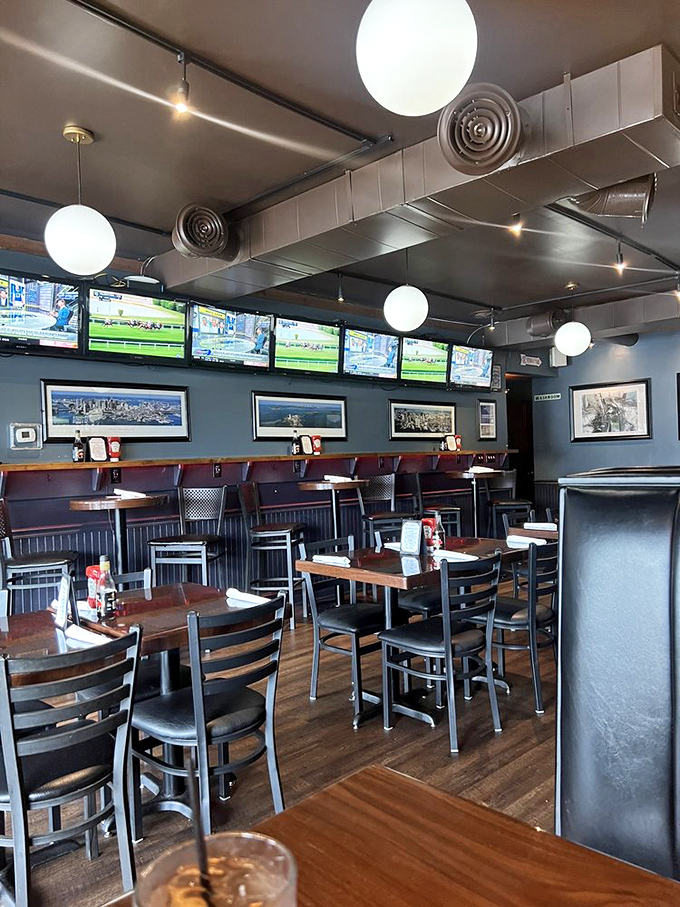 Blue walls, wooden tables, and multiple screens showing Boston sports &ndash; it's like they airlifted a corner of Fenway Park to Tennessee.