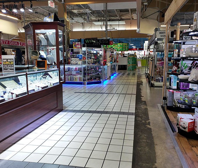 Gleaming display cases and tiled walkways create a mall-like atmosphere, minus the corporate uniformity. Each booth tells its own story through carefully arranged merchandise.