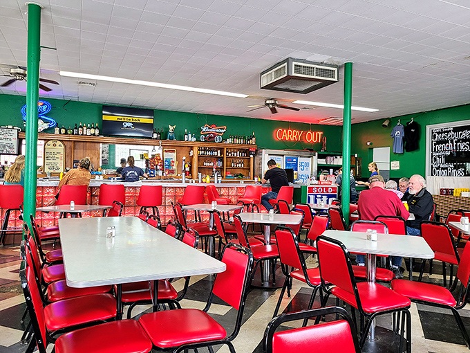 Red vinyl chairs and green walls create the perfect backdrop for serious eating &ndash; no Instagram filters required for this authentic diner experience.