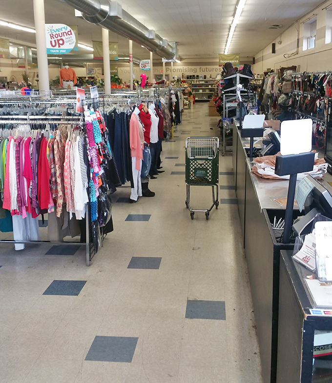 Racks upon racks of clothing stretch into the distance like a textile sea, each item waiting for its second chance at fashion greatness.