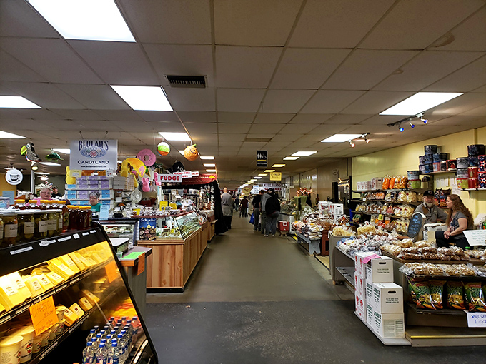 The indoor market corridor feels like a food lover's fever dream&mdash;candy displays, baked goods, and snacks stretching as far as the eye (and waistband) can see.