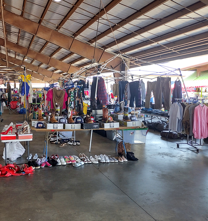 A gathering spot where shoppers take a break from treasure hunting. The high ceilings keep the Texas heat at bay while conversations and commerce flourish below.