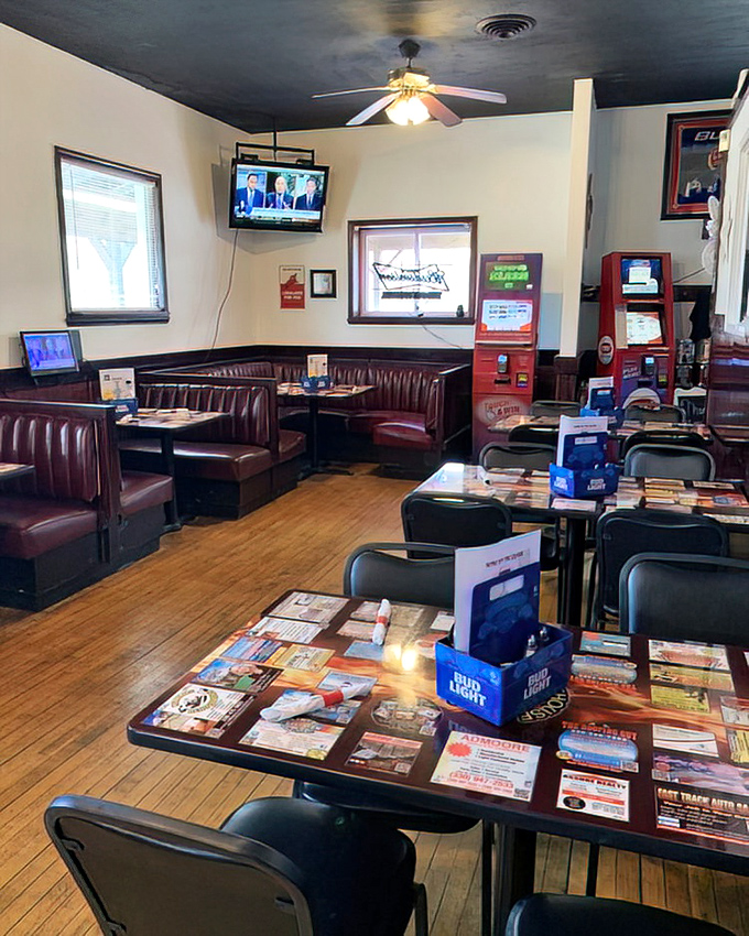 Cozy leather booths and wooden tables create that perfect neighborhood pub atmosphere where conversations flow as freely as the drinks.