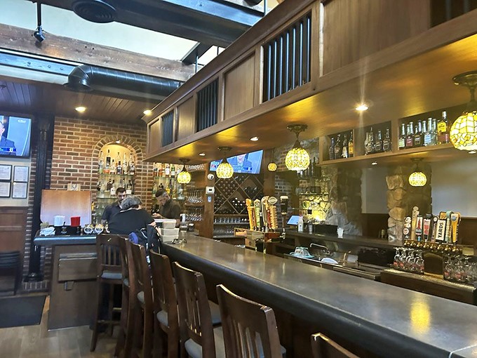 The bar at Spring House Tavern isn't just where drinks are served&mdash;it's where strangers become friends and regulars become family, all under the glow of those gorgeous pendant lights.