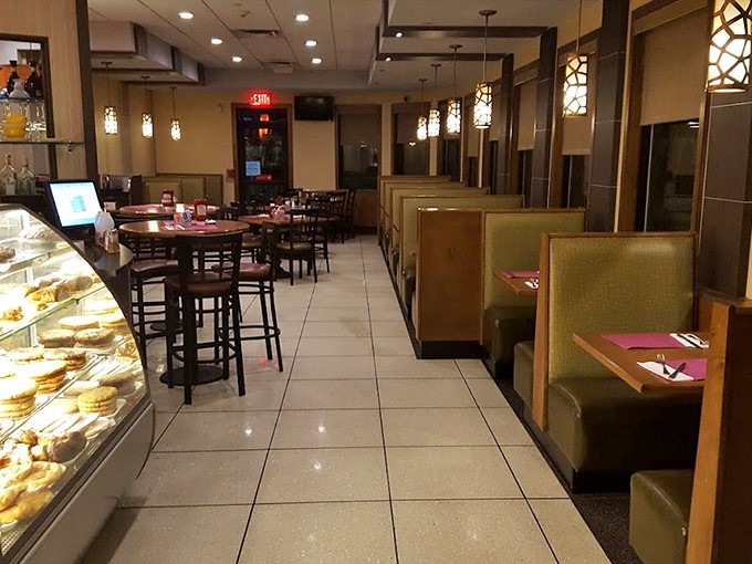 Classic diner geometry: booths along the wall, dessert case tempting you from the start, and that unmistakable feeling that breakfast is always just minutes away.