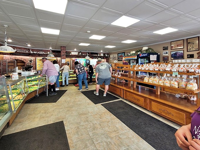 Inside Kennedy's, wooden shelves overflow with temptation while locals queue up for their regular orders like pilgrims at a delicious shrine.