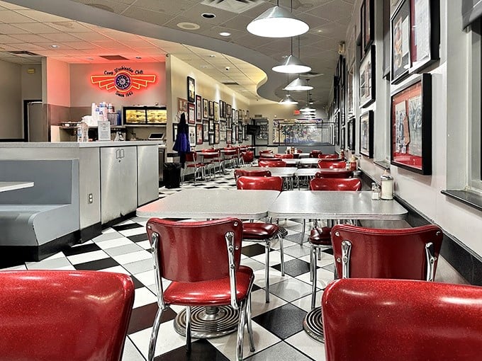 Classic Americana at its finest—red vinyl stools, checkerboard floors, and walls of fame create the perfect backdrop for Cincinnati's most famous culinary tradition.