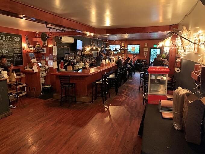 Step inside to discover a warm, wood-toned sanctuary where the holy trinity of barbecue, bourbon, and good company converge in perfect harmony.