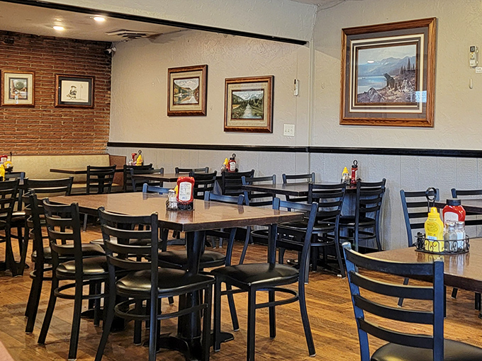 Inside Clyde's, framed landscapes and wooden tables create that perfect "everybody knows your name" atmosphere where comfort food meets comfortable surroundings.