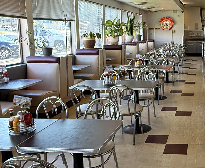 Classic chrome, checkerboard floors, and cozy booths &ndash; stepping into the Owl Cafe is like walking straight into 1955.