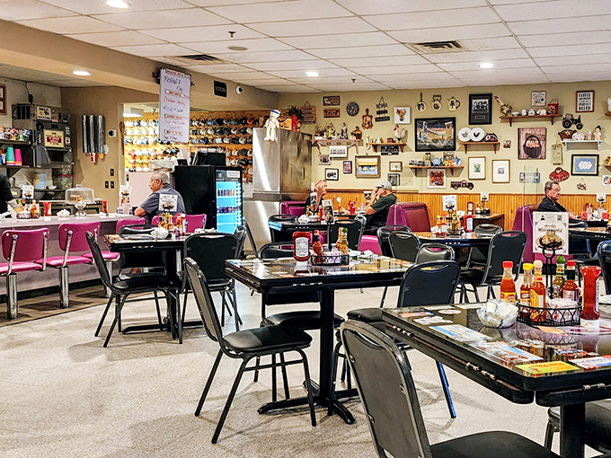 When someone asks what organized chaos looks like, show them this photo of pure diner joy and collectibles.