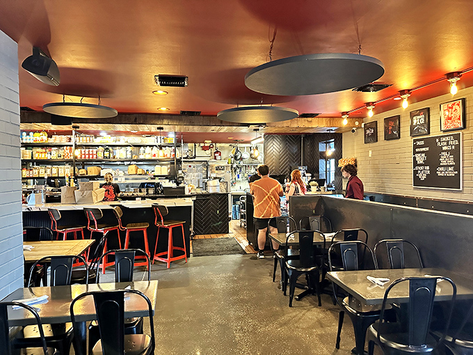 Industrial-chic meets barbecue comfort inside Pig Floyd's, where the copper ceiling and open kitchen create an atmosphere as warm as their smokers.
