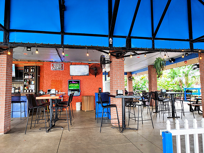 The interior strikes that perfect balance between "I'm on vacation" and "I could become a regular here." String lights and open-air seating seal the deal.