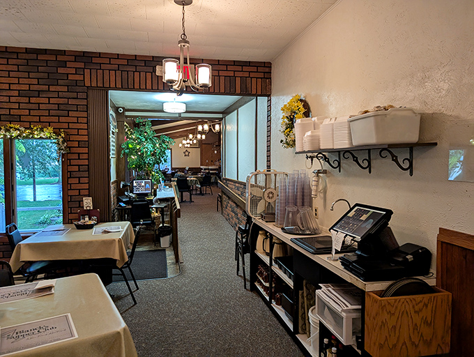 Step inside and the transition is immediate&mdash;warm brick walls, simple decor, and an atmosphere that whispers, "You're among friends now."