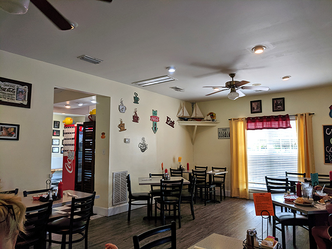 Coastal charm meets breakfast comfort inside Duck's, where ceiling fans lazily spin above tables that have witnessed countless vacation morning memories.