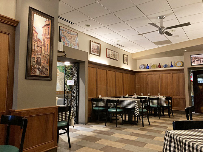 Wood paneling and checkered tablecloths create that perfect "nonna's dining room" vibe. No Edison bulbs or reclaimed wood here&mdash;just authentic Italian atmosphere that's stood the test of time.