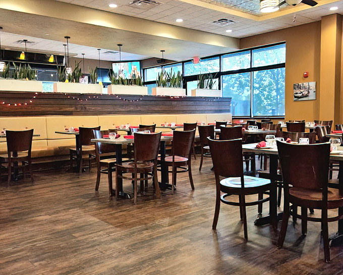 Warm wood tones and thoughtful design create that perfect "not too fancy, not too casual" sweet spot where memorable meals happen.