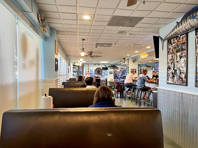 Step inside to a world where nautical charm meets comfort. Those blue walls and wooden booths have witnessed countless "this is the best I've ever had" moments.
