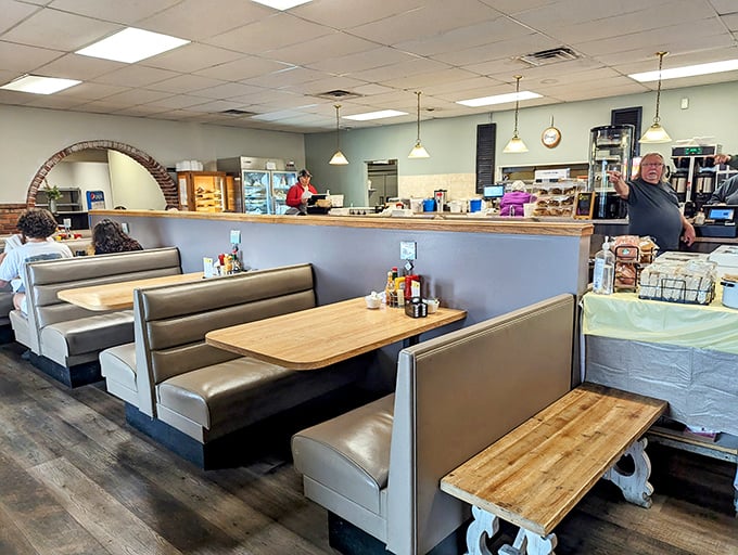 Classic diner booths and pendant lighting create that perfect "come as you are" atmosphere where comfort trumps pretension.